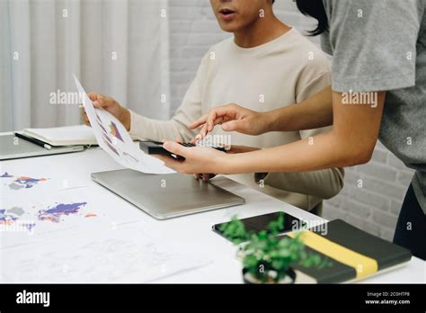 Man Woman Colleagues Analyzing Data On Computer Startup Teamwork Coworking Team Working At Home