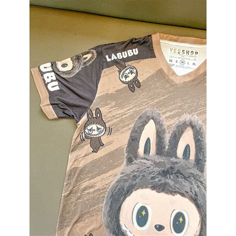 เสื้อยืดลาย ลาบูบู้ Labubu สีน้ำตาล Shopee Thailand