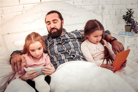 Nice Young Girls Playing On Their Devices Stock Image Image Of