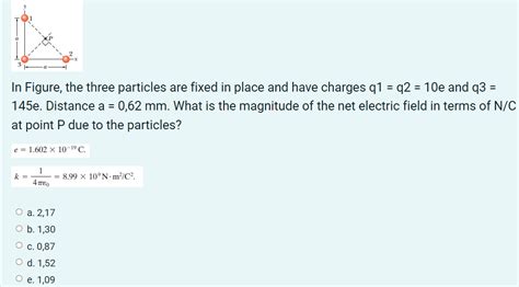 Solved In Figure The Three Particles Are Fixed In Place And Chegg Com