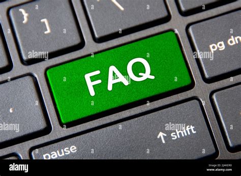 Question And Answer Concept Laptop Keyboard With Green FAQ Button Stock Photo Alamy