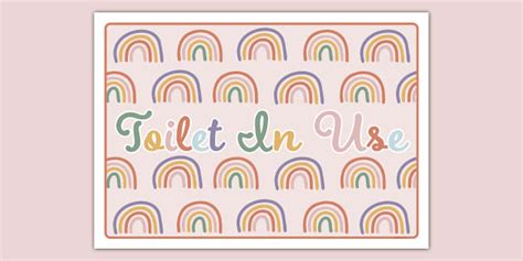 Muted Rainbow Themed Toilet In Use Display Poster Twinkl