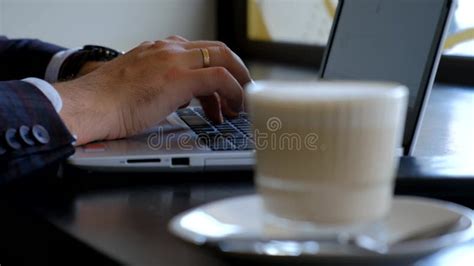Typing On A Laptop Keyboard In Close Up Hands Typing On Computer Keys Stock Video Video Of