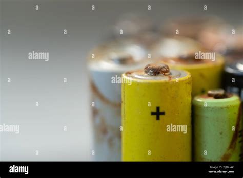 Closeup Of Used Battery With Traces Of Rust And Corrosion Electronic