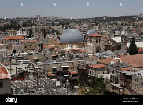 Rooftops In The Old City Of Jerusalem And The Grey Domes Of The Church