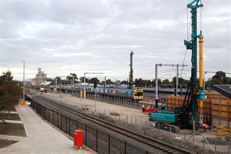 Edi Comeng Train Passes A Piling Rig At Work On The Melbourne Airport