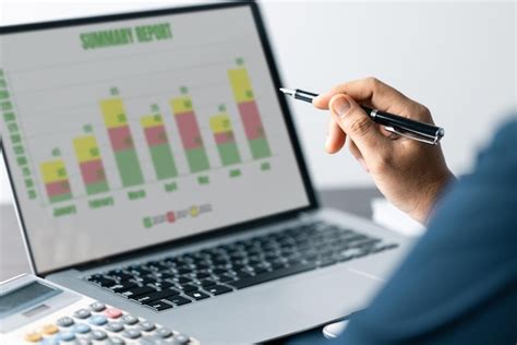 Premium Photo Business Data Analysis On Laptop Financial Charts Graphs Reports For Successful