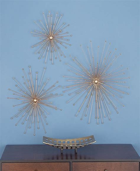 Rosemary Lane Gold Metal Starburst 3d Wall Decor Set Of 3 13 17 21