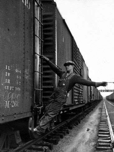 Railroad Brakeman George Christian Swinging His Arm Horizontally To