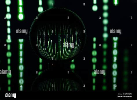 Dark Background With Computer Binary Code And A Ball The Concept Of