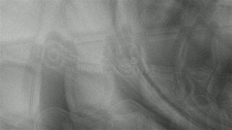 Abstract Close Up Of Flowing Fabric Creating Soft Textures In A Monochromatic Grayscale