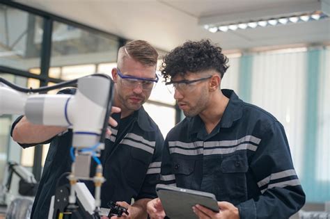 Premium Photo Robotics Control Engineers Solve Problems And Setting