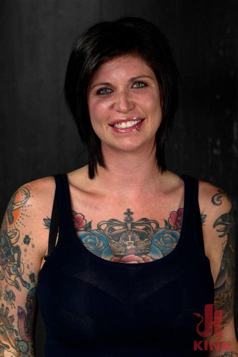 Kathryn Dupri Submits To Leather Restraint