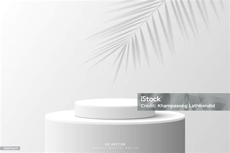 3d 흰색 회색 실린더 연단 받침대는 야자수 잎 그림자 배경이 있는 거대한 둥근 받침대에 현실적으로 배치됩니다 제품 모형 또는 프레젠테이션을 위한 최소한의 벽 장면