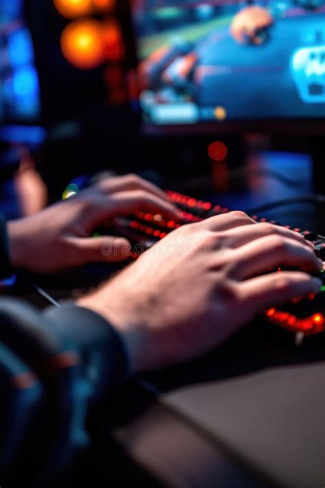 Close Up Of Male Hands On PC Gaming Keyboard And Controller Hands Grasp Joystick And Press Keys