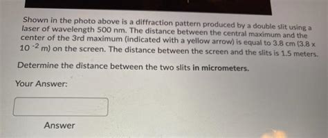Solved Shown In The Photo Above Is A Diffraction Pattern Chegg Com