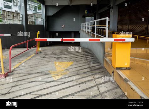 A Barrier And Access Verification Panel At The Exit Of An Underground Private Carpark Stock
