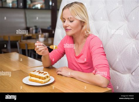 Pretty Blonde Having A Cake Stock Photo Alamy