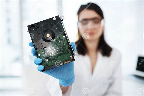 Repaired And Ready For Use A Young Woman Repairing Computer Hardware