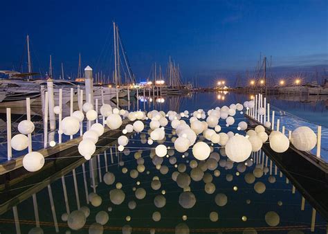 Sensual Wave Installation Illuminates An Empty Dock At French Harbour