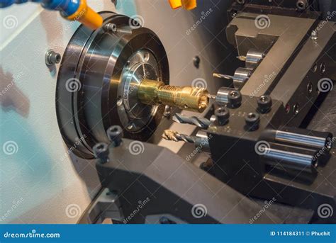 The CNC Lathe Machine Cutting The Brass Shaft Stock Image Image Of Aluminum Brass