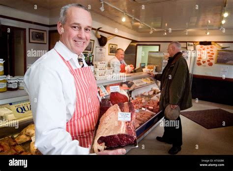 The Village Butcher And Shop In The Small Northumberland Village Of Norham On The Scottish