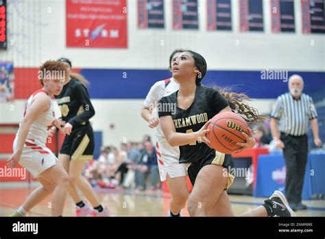 Usa Player Driving The Baseline On A Scoring Journey To The Basket During A High School Varsity
