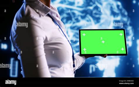 admin in data center with chroma key tablet using artificial