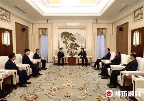 刘运会见齐鲁银行客人潍坊郑祖刚合作