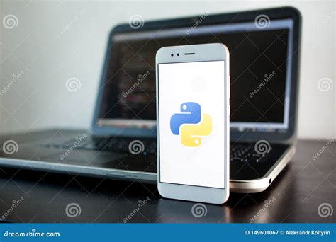 Python Programming Language Round Logo Sticker Symbol Label Laying On A Laptop Keyboard