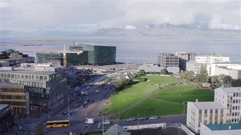 Premium Stock Video Cityscape In Reykjavik With Green Arnarhóll Park Travel Destination Iceland