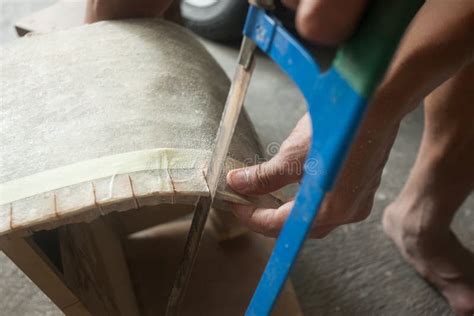 Man Using Metal Hacksaw To Cut Stock Image Image Of Wooden Hole
