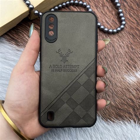 قاب گوشی Galaxy A01 Galaxy M01 سامسونگ چرمی ژله ای طرح گوزنی Deer ایربگ دار خاکستری کد 24482
