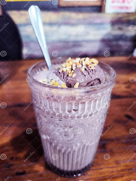 A Glass Of Chocolate Float Sprinkled With Nuts Stock Image Image Of
