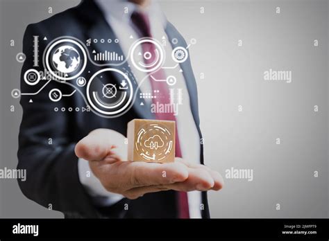 Businessman Holding Cloud Computing Diagram Show On Wood Block Hand