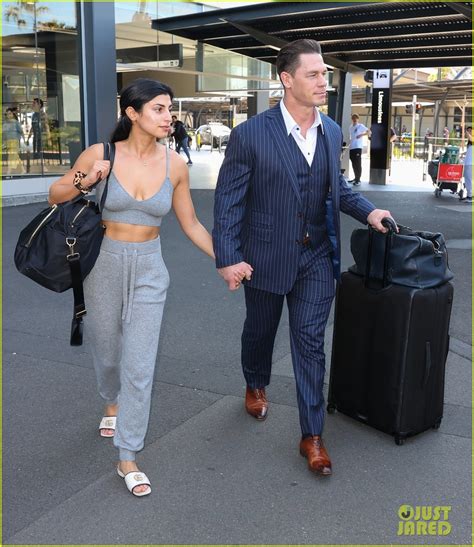 John Cena Looks Sharp In Pin Striped Suit While Arriving In Australia