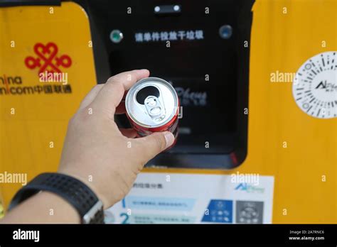 an artificial intelligence ai garbage sorting bin is displayed at
