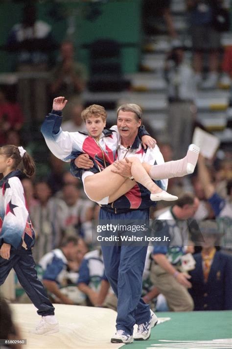 Summer Olympics Usa Coach Bela Karolyi Victorious Carrying Kerri