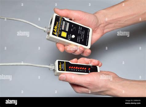 Hands Of The Installer Ethernet Test Lan Tester Computer Cable Stock
