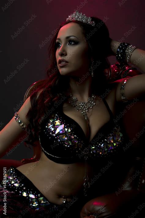 Portrait Of Sexy Perfect Woman In Black Stage Costume With Crystals And