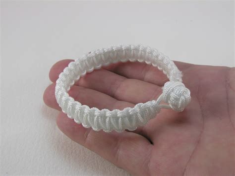 Knots And Fiber Bracelets White Macrame Toggle Bracelet With Monkey Fist Knot 1203