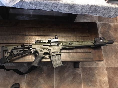 Typhoon F12 Shotgun Gas Operated Bolt R Canadaguns