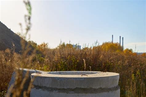 Close Up Of A Concrete Well In The Grass Stock Image Image Of