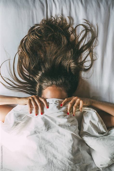 Woman Hair Peeking Out From Blanket By Stocksy Contributor Studio Firma Stocksy
