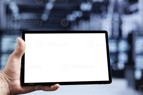 Skilled It Programmer Using Mock Up Tablet To Check Operational Server