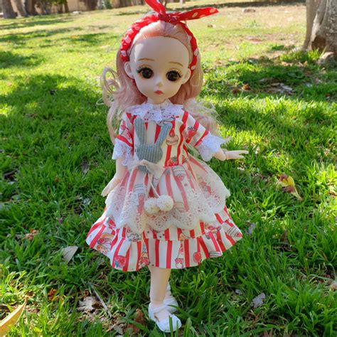 قیمت و خرید عروسک مدل تمام مفصلی موزیکال طرح چشم تیله ای انیمه ای ارتفاع 30 سانتی متر