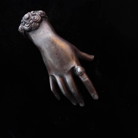Antique Bronze Hand At Meagan Michael Blog
