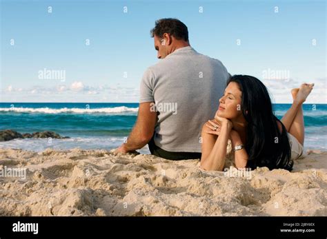 Woman Laying On Belly Legs Together