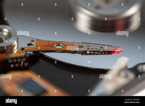 Computer Hard Disk Opened Read Write Head On The Storage Disk Symbol Image Stock Photo Alamy