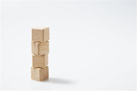 Premium Photo Four Empty Wooden Cube Blocks Stack